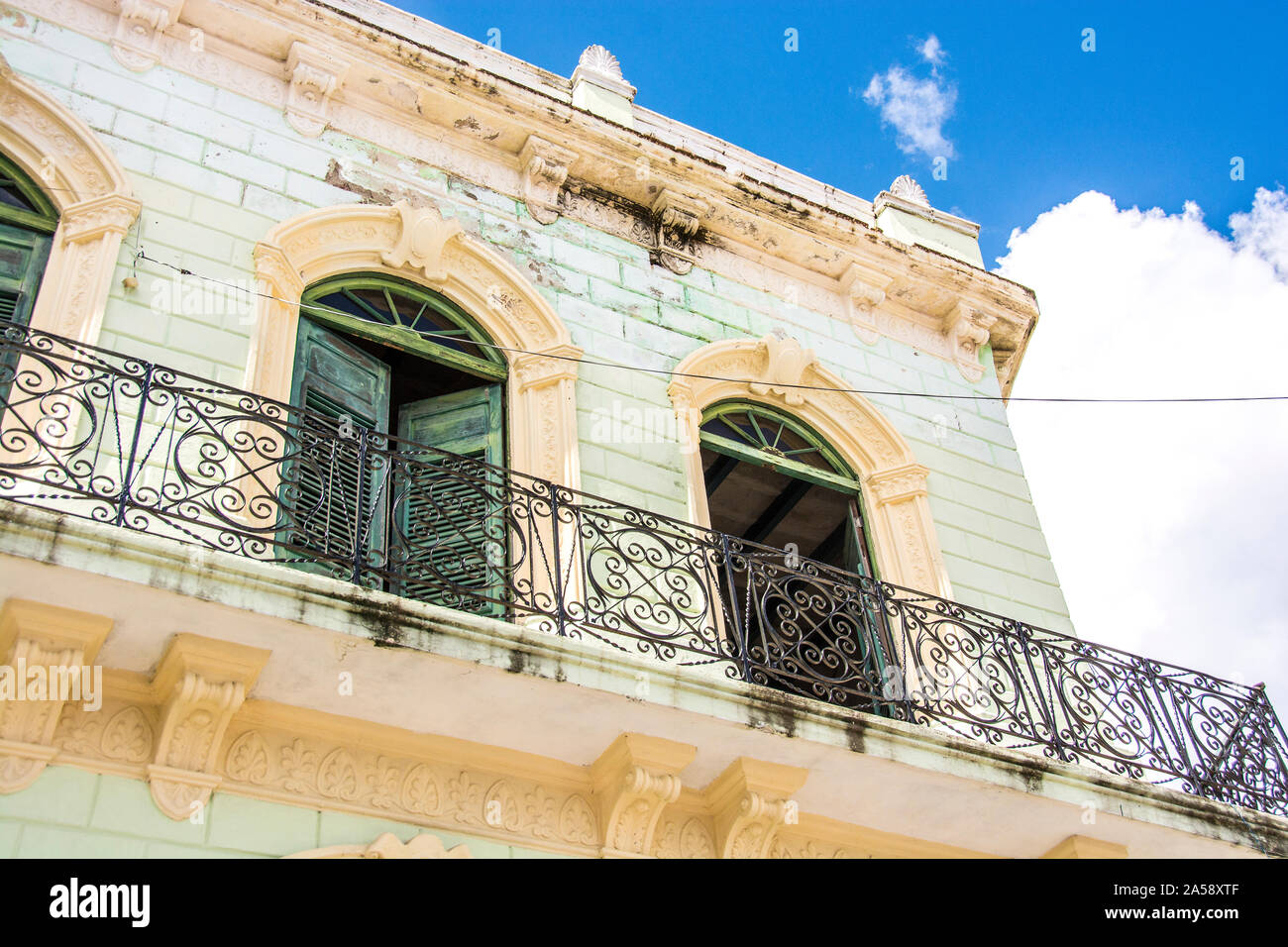 Three windows of a building; Camaguey, Cuba Stock Photo - Alamy