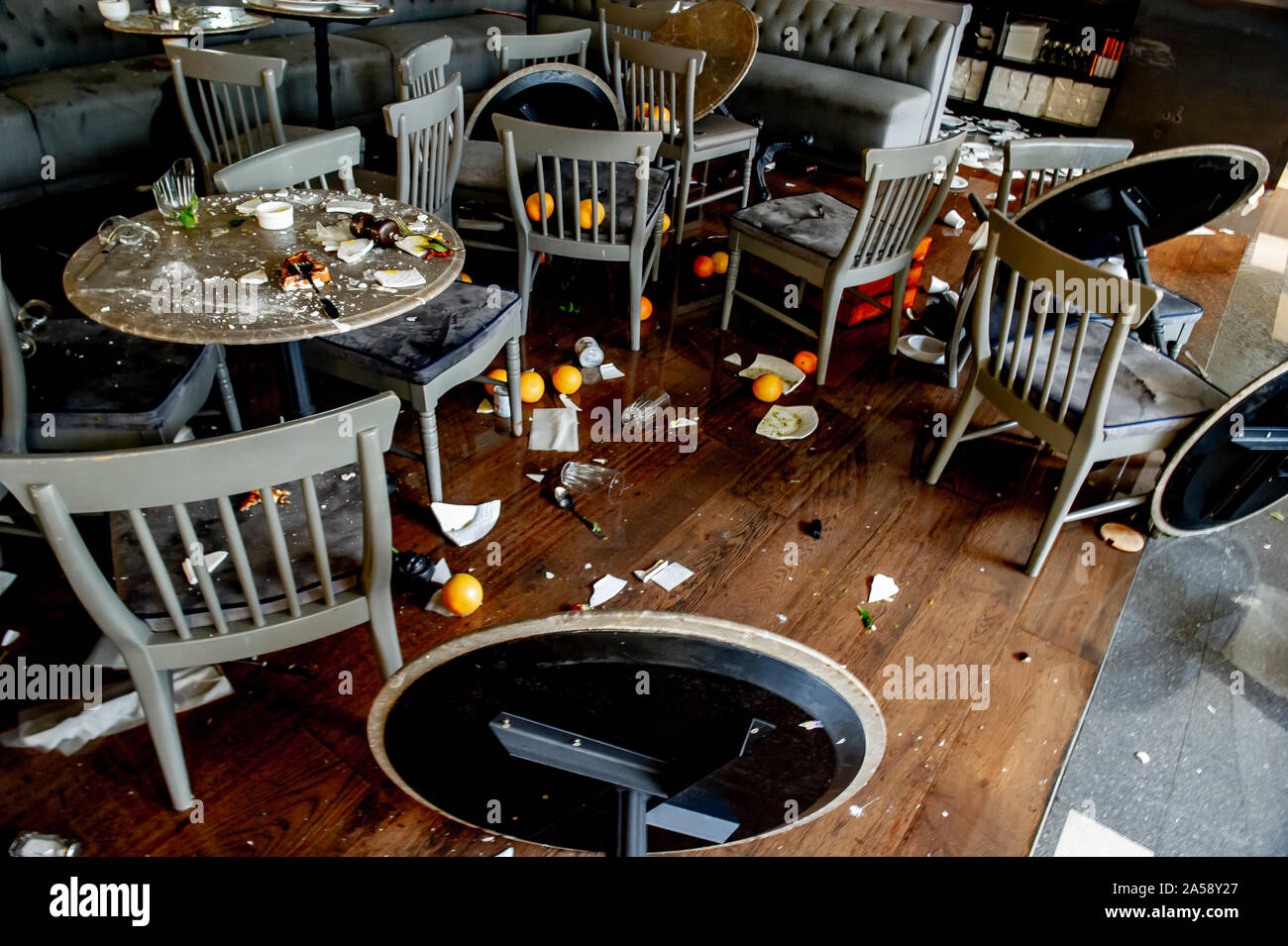Overturned tables hi-res stock photography and images - Alamy