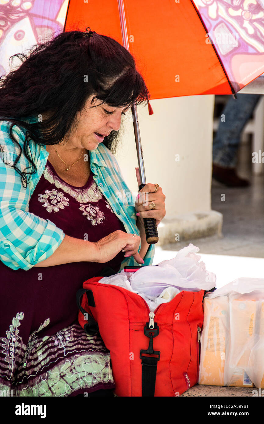 Overweight woman sitting on bench hi-res stock photography and images ...