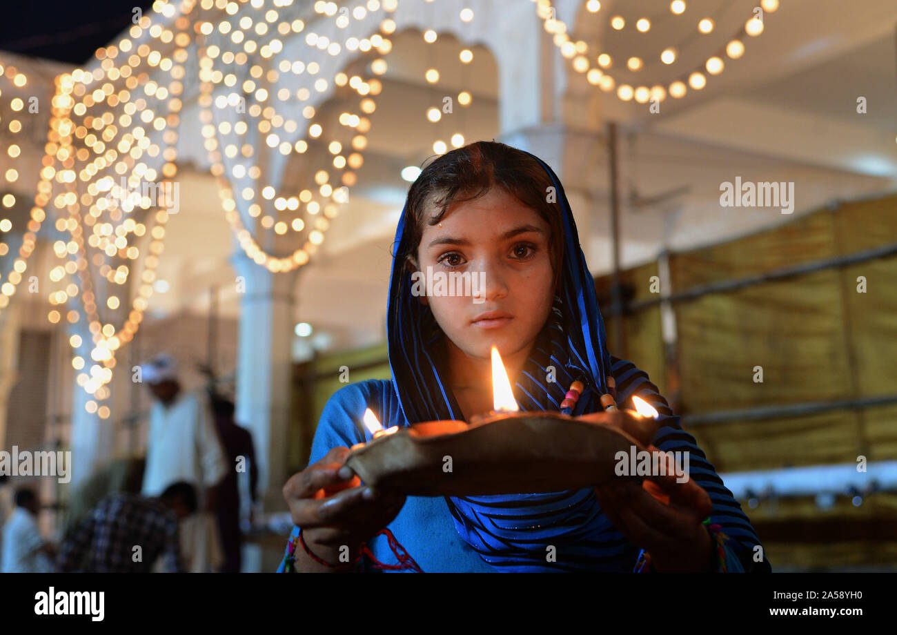 Pakistani devotee people gather at the shrine of Sufi Saint Hazrat Ali Bin Usman popularly known ...