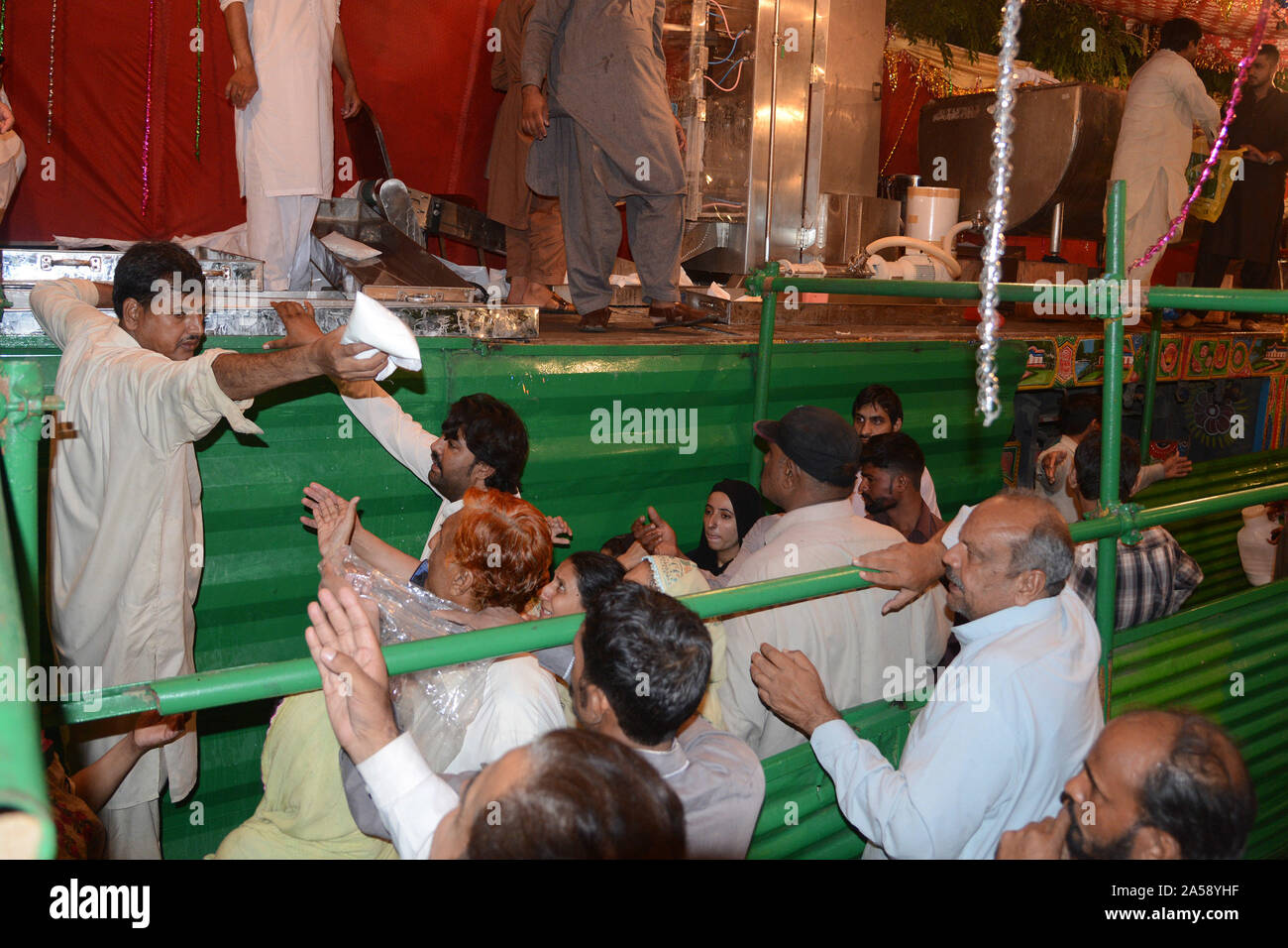 Pakistani devotee people gather at the shrine of Sufi Saint Hazrat Ali Bin Usman popularly known ...