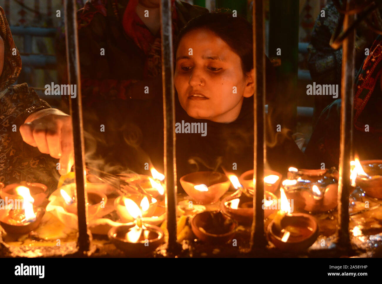 Pakistani devotee people gather at the shrine of Sufi Saint Hazrat Ali Bin Usman popularly known ...