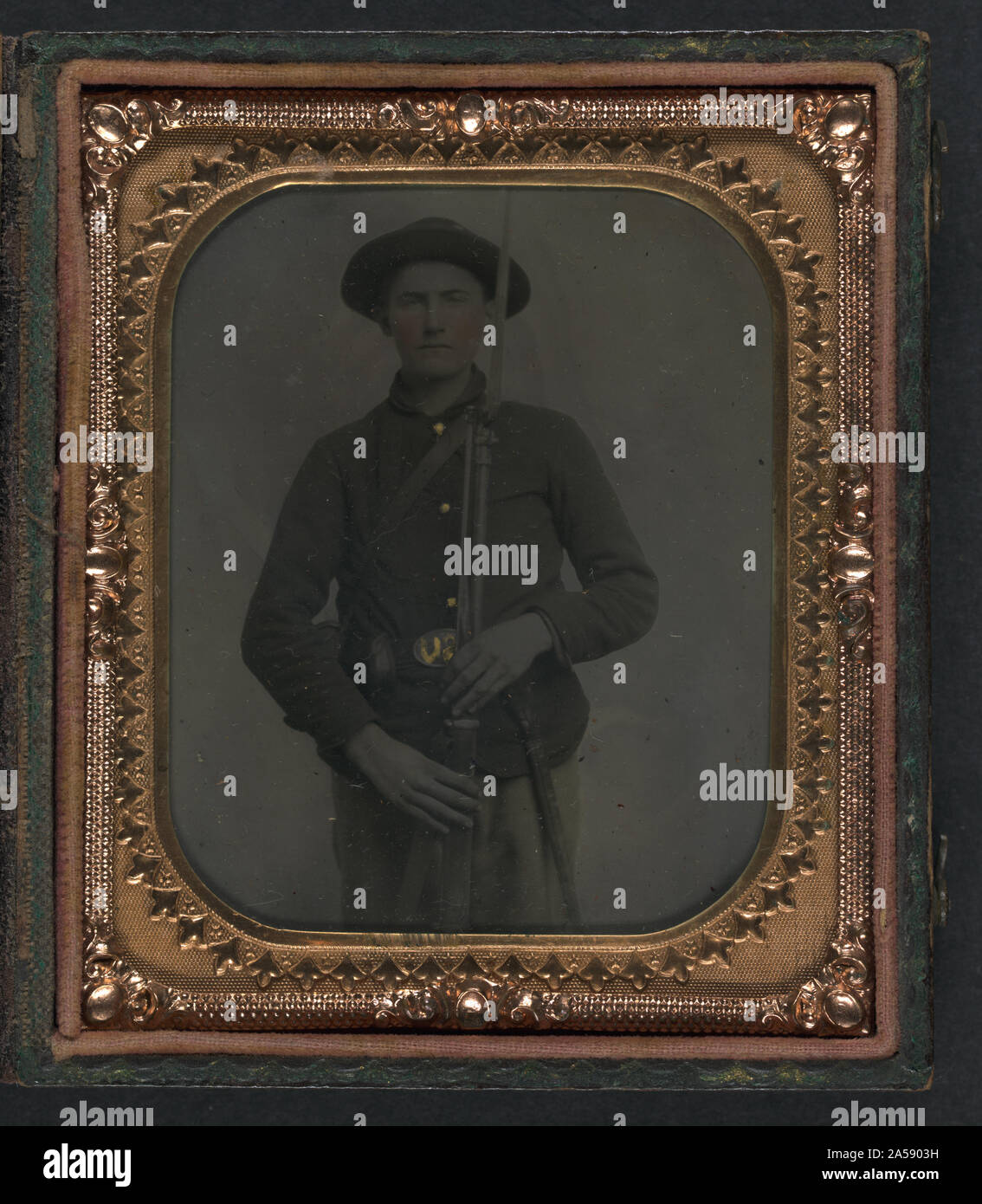 Unidentified soldier in Union uniform and slouch cap with bayoneted ...