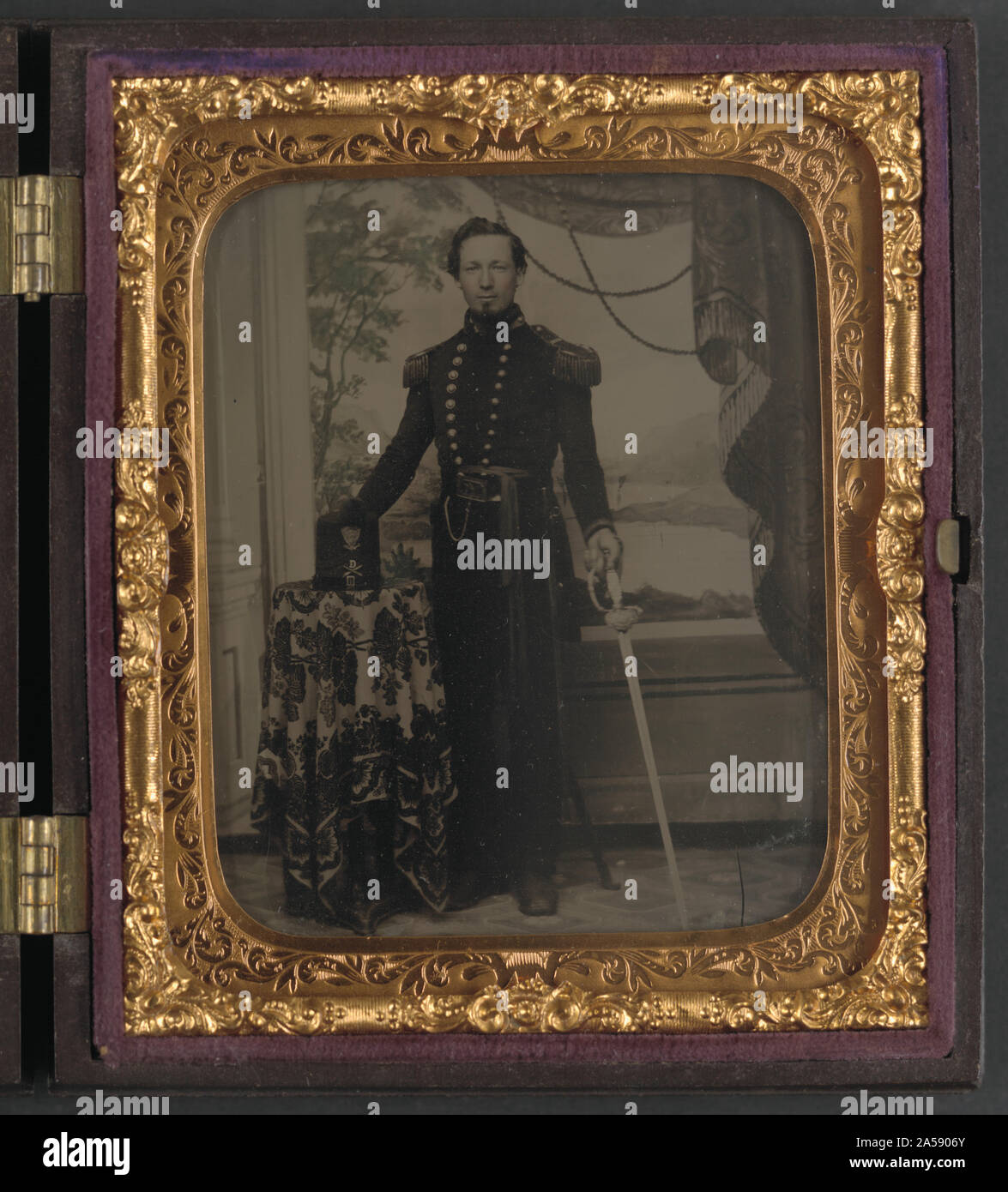 Unidentified soldier in Union uniform holding sword, with Company D ...