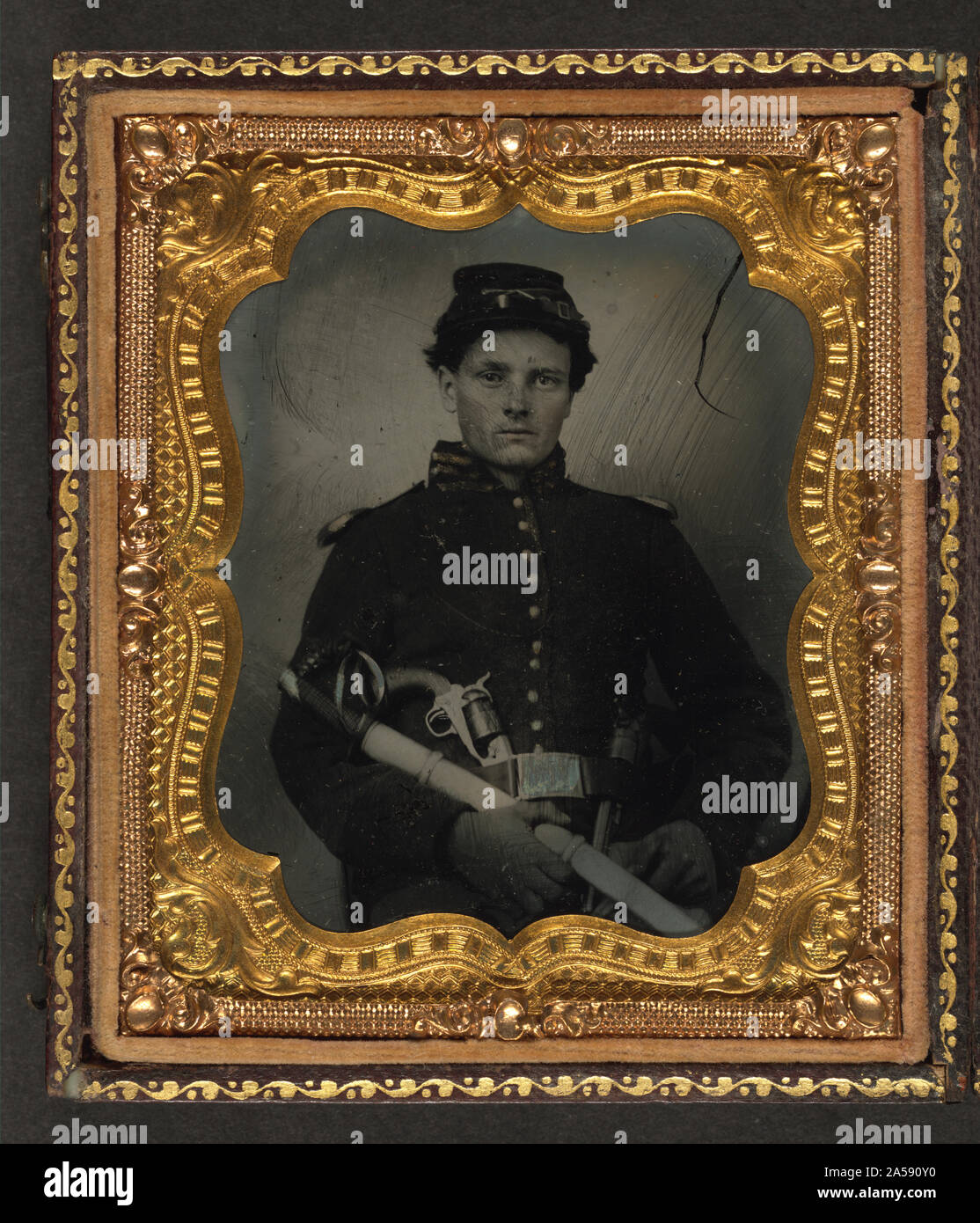 Unidentified soldier in Union uniform with dual revolvers and saber ...