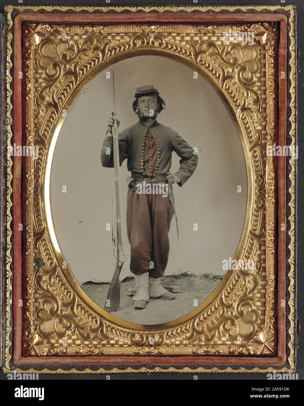 Unidentified soldier in Union zouave uniform with bayoneted musket with ...
