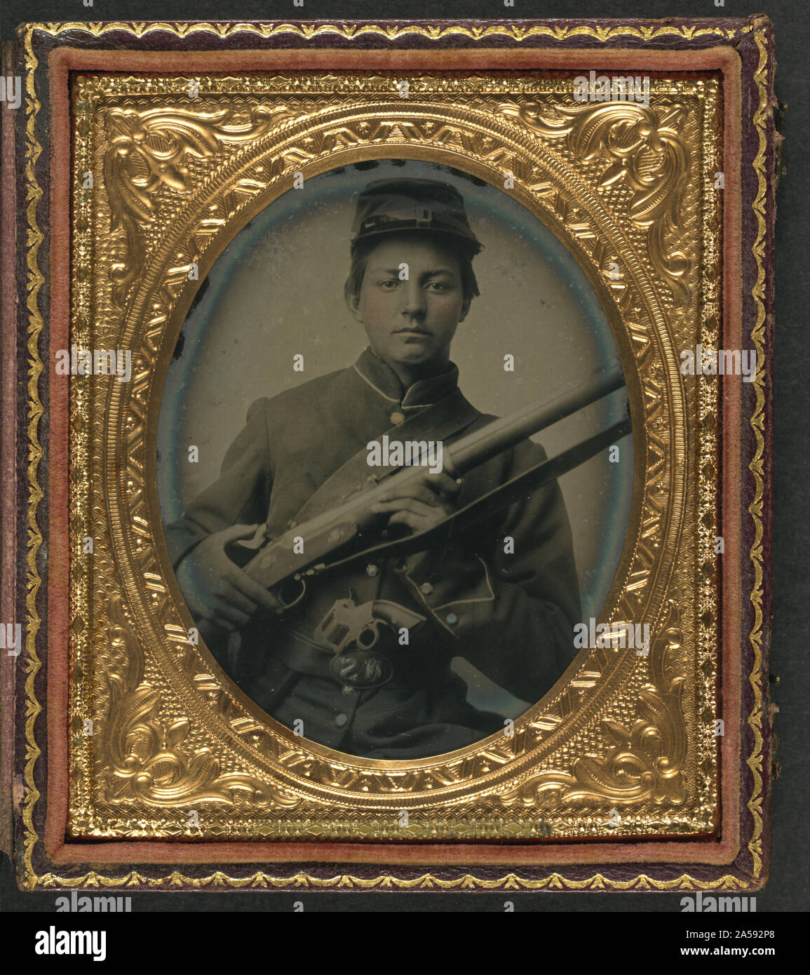 Unidentified young soldier in Union uniform holding musket with ...