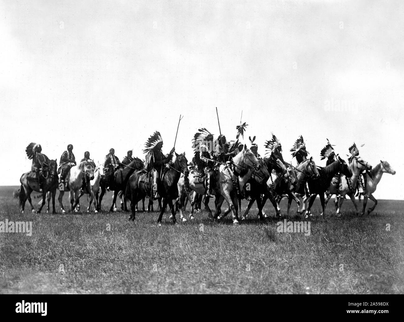 Edward S. Curtis Native American Indians - Brulé Indians, many wearing ...