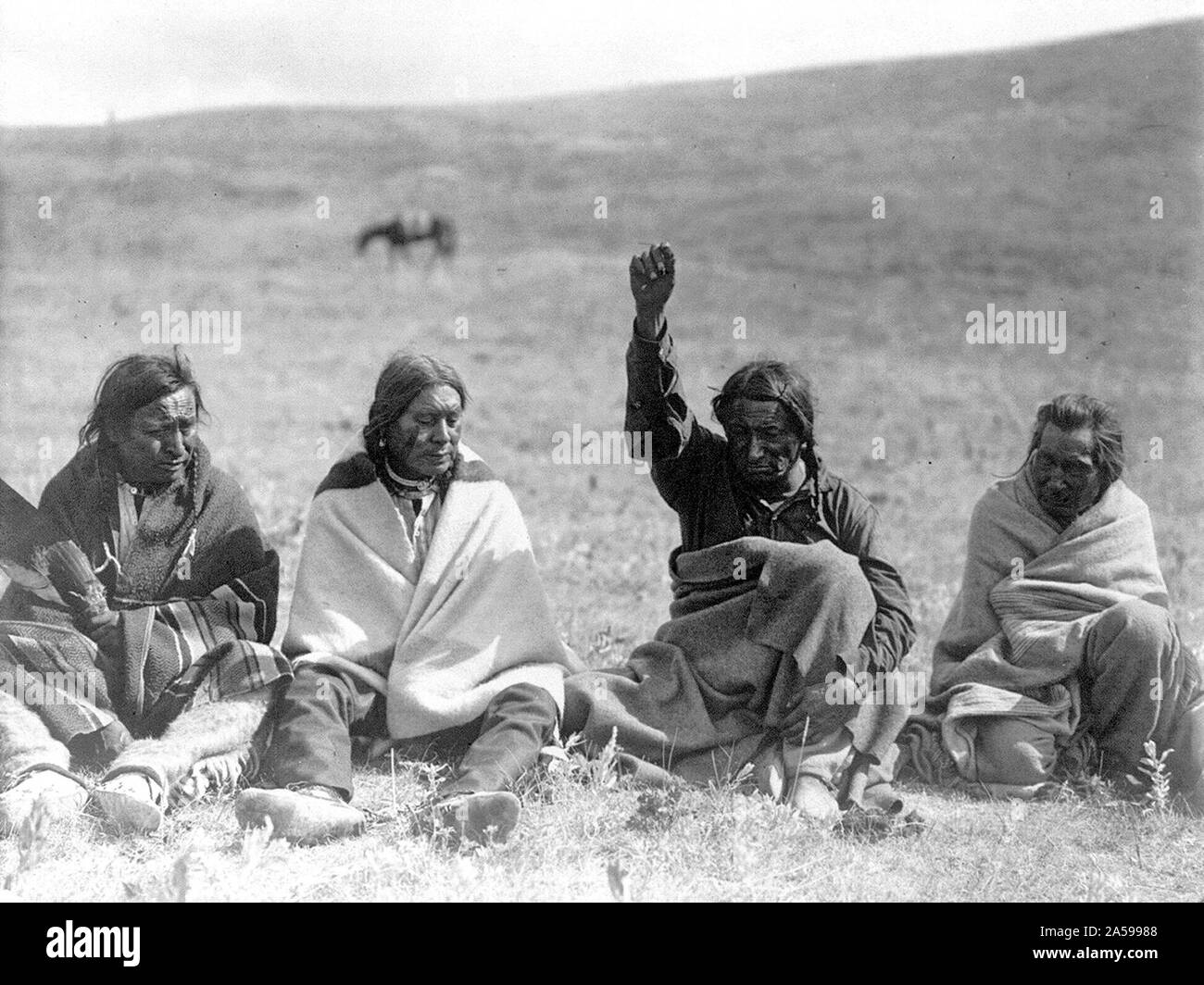 Edward S. Curtis Native American Indians - Four Atsina men, one with ...