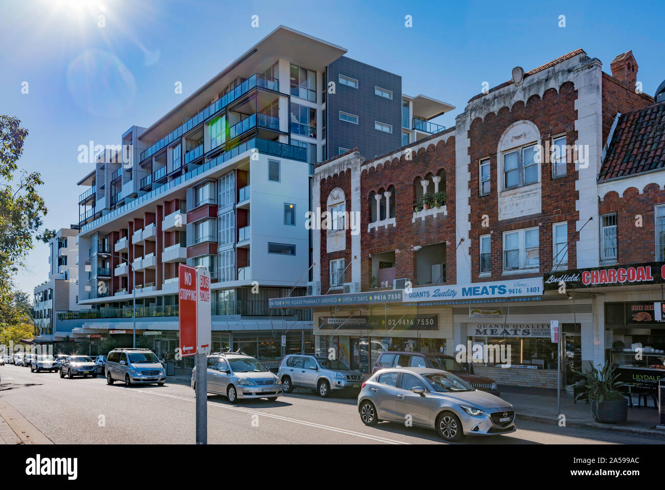 A modern multistory apartment and retail block blends and combines with ...