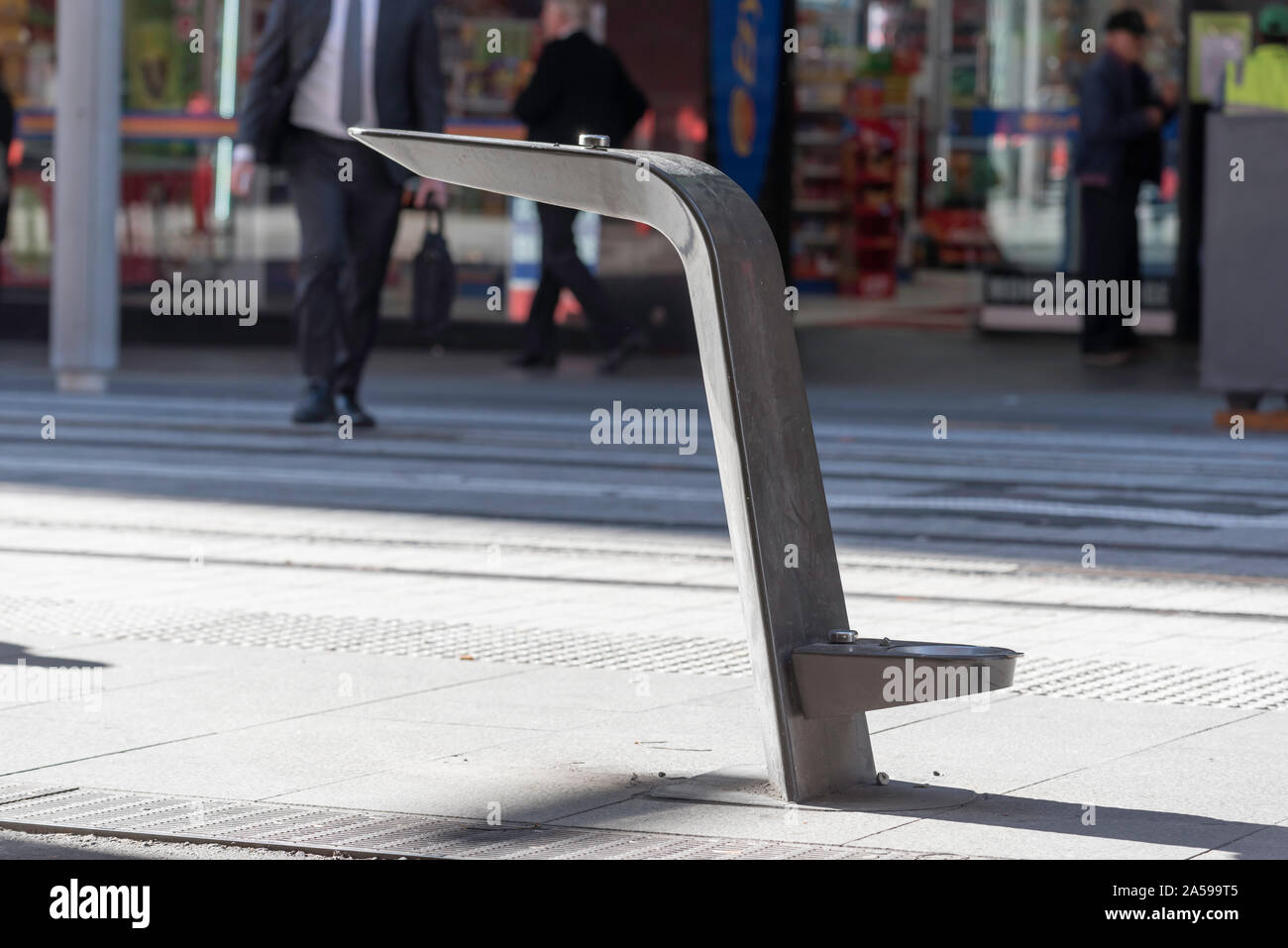 A modern almost space age bubbler or water fountain on George Street in ...