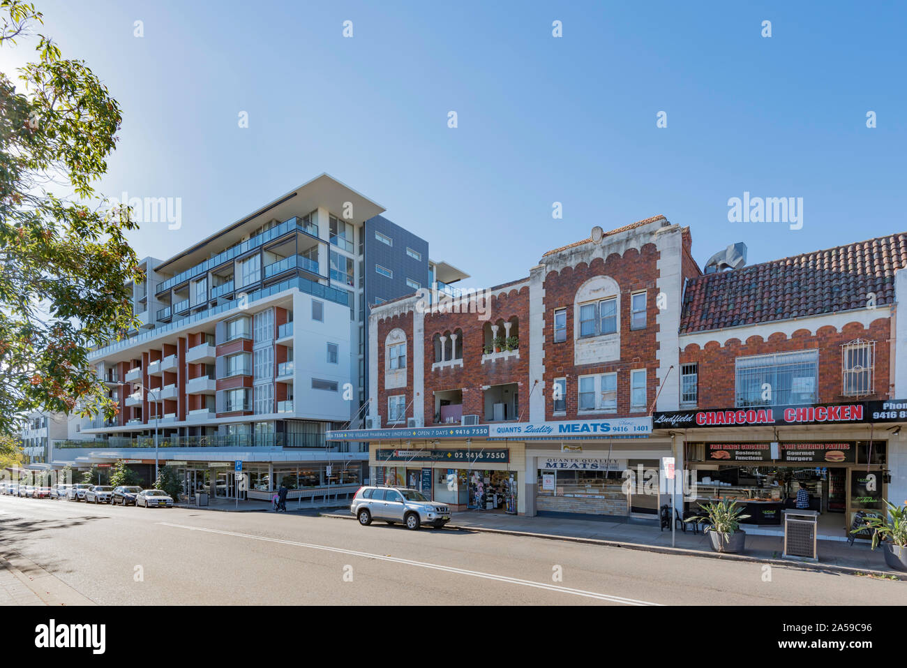 A modern multistory apartment and retail block blends and combines with ...