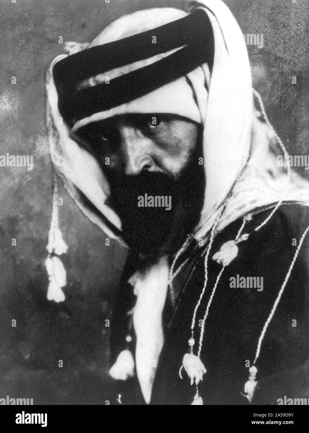 Head and shoulders of man, (3 - facing left - left side of face is most ...