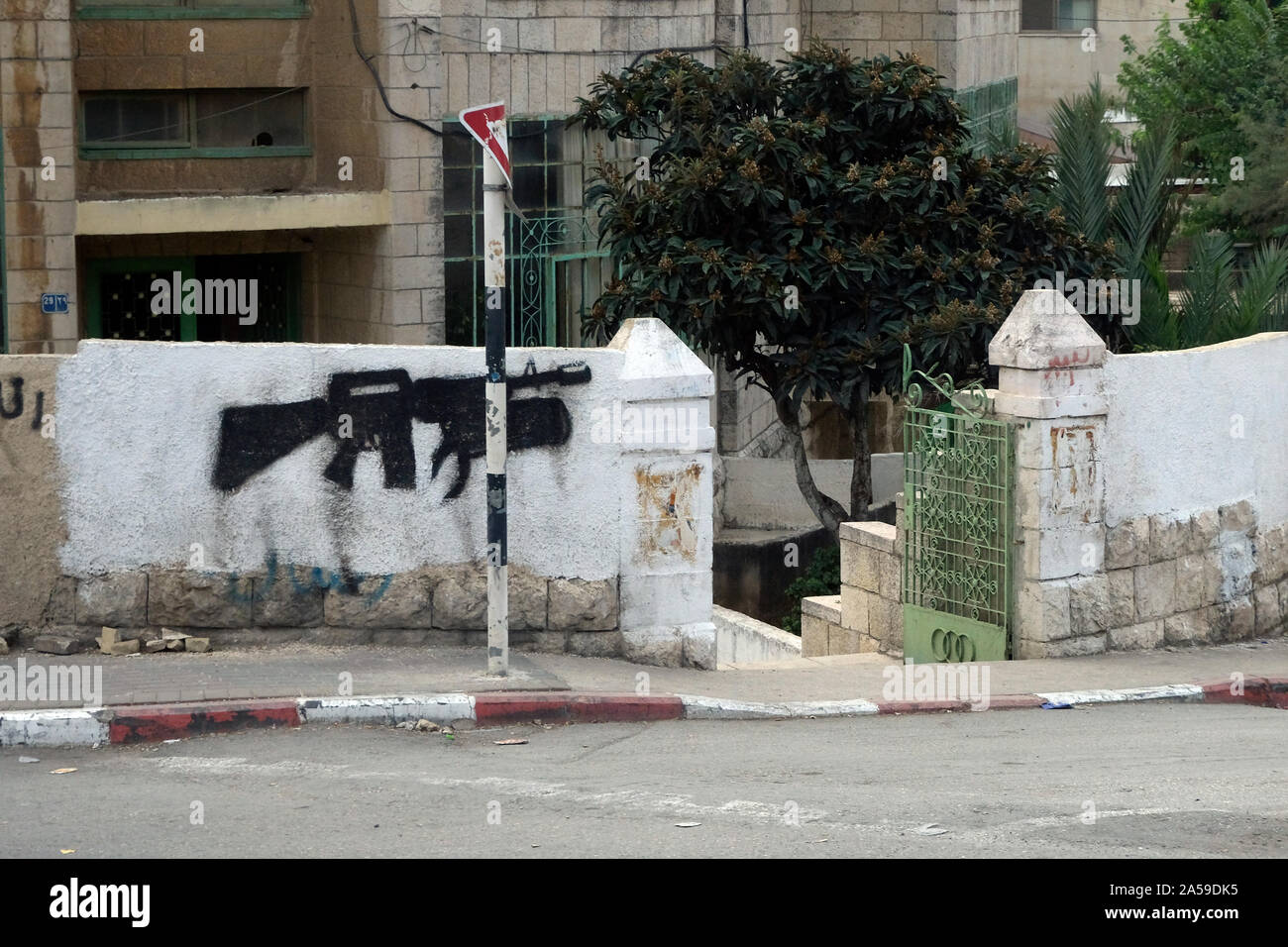 A graffiti showing a M203 rifle equipped with M651 Tactical CS (tear ...