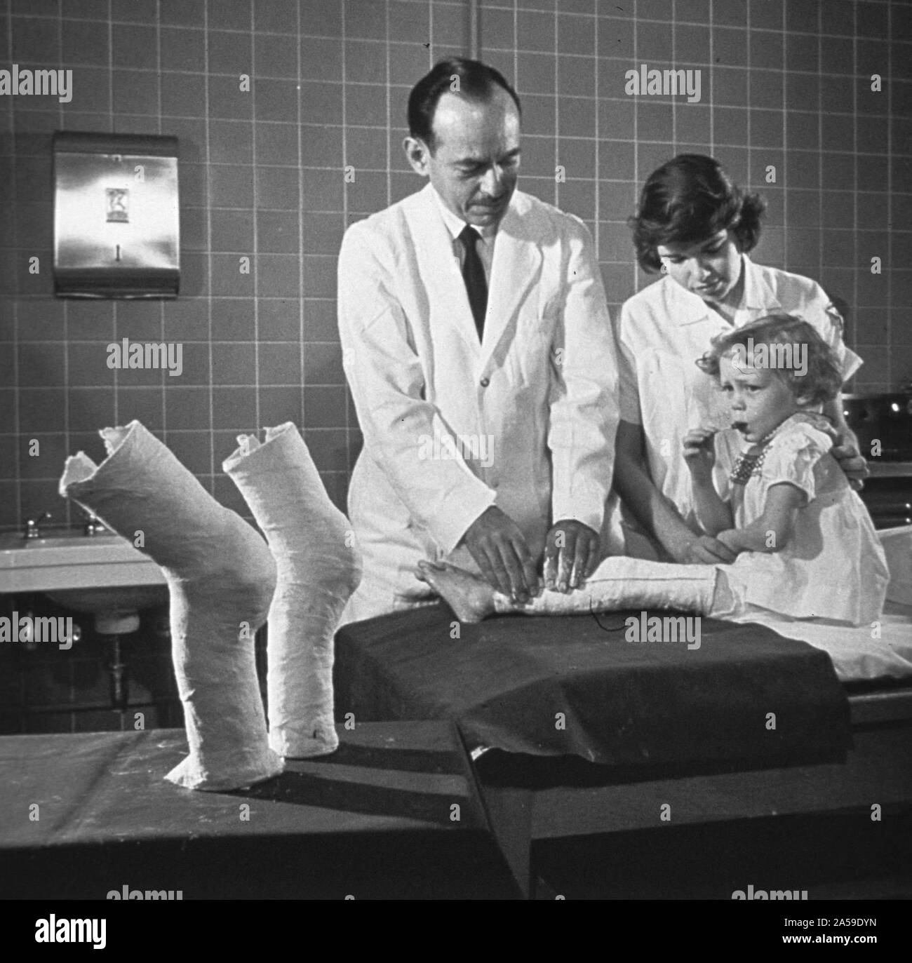 Vintage leg cast Black and White Stock Photos & Images - Alamy