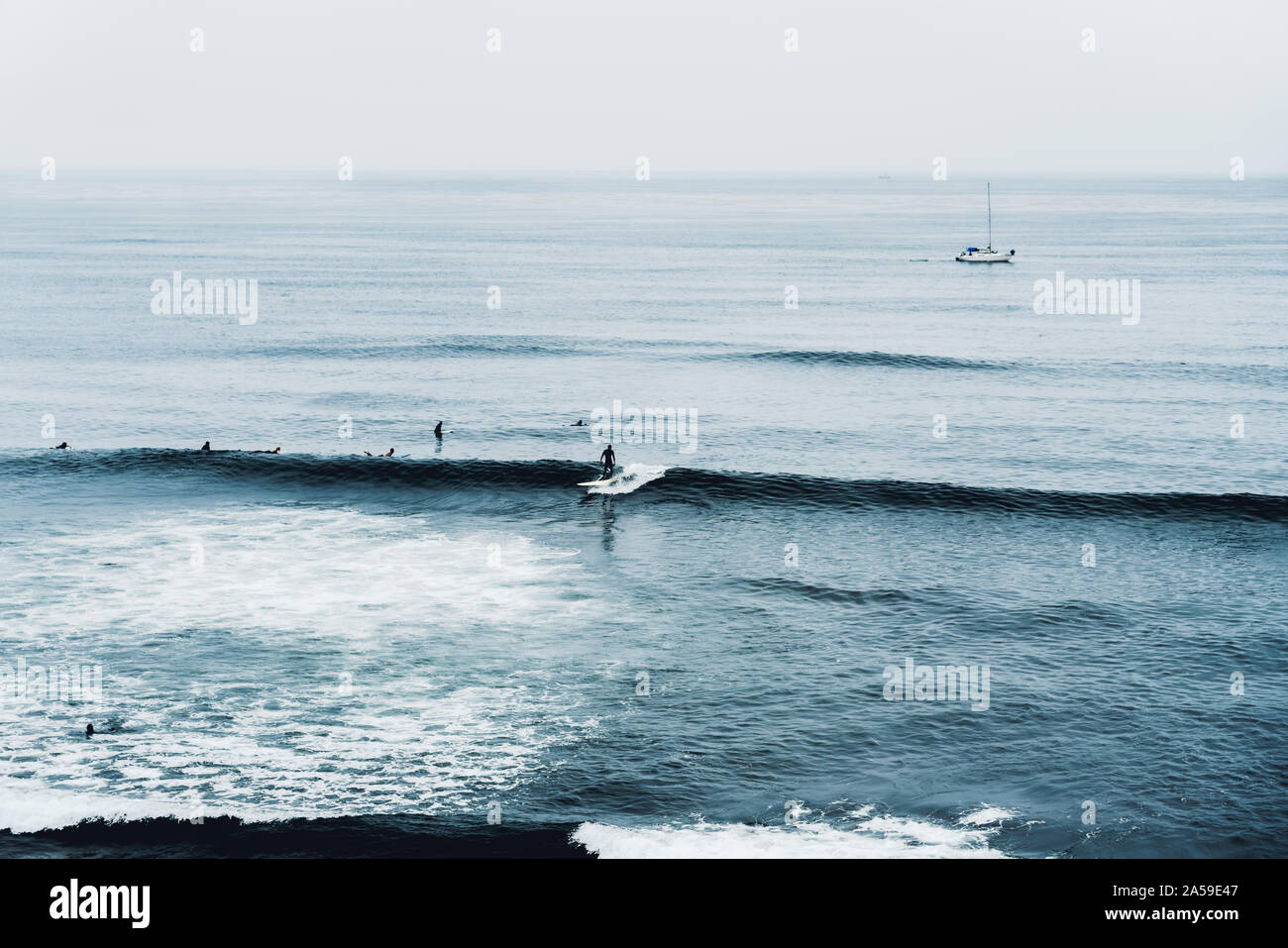Aerial view, horizon over the sea with surfing silhouette. Dramatic ...