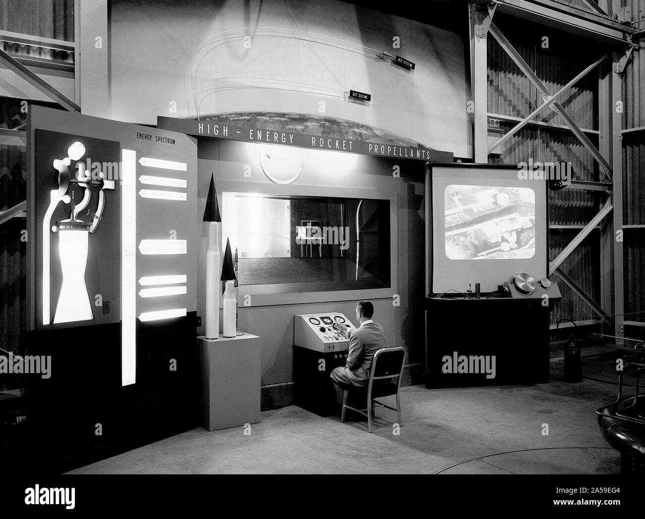 A researcher works a demonstration board in the Rocket Engine Test ...