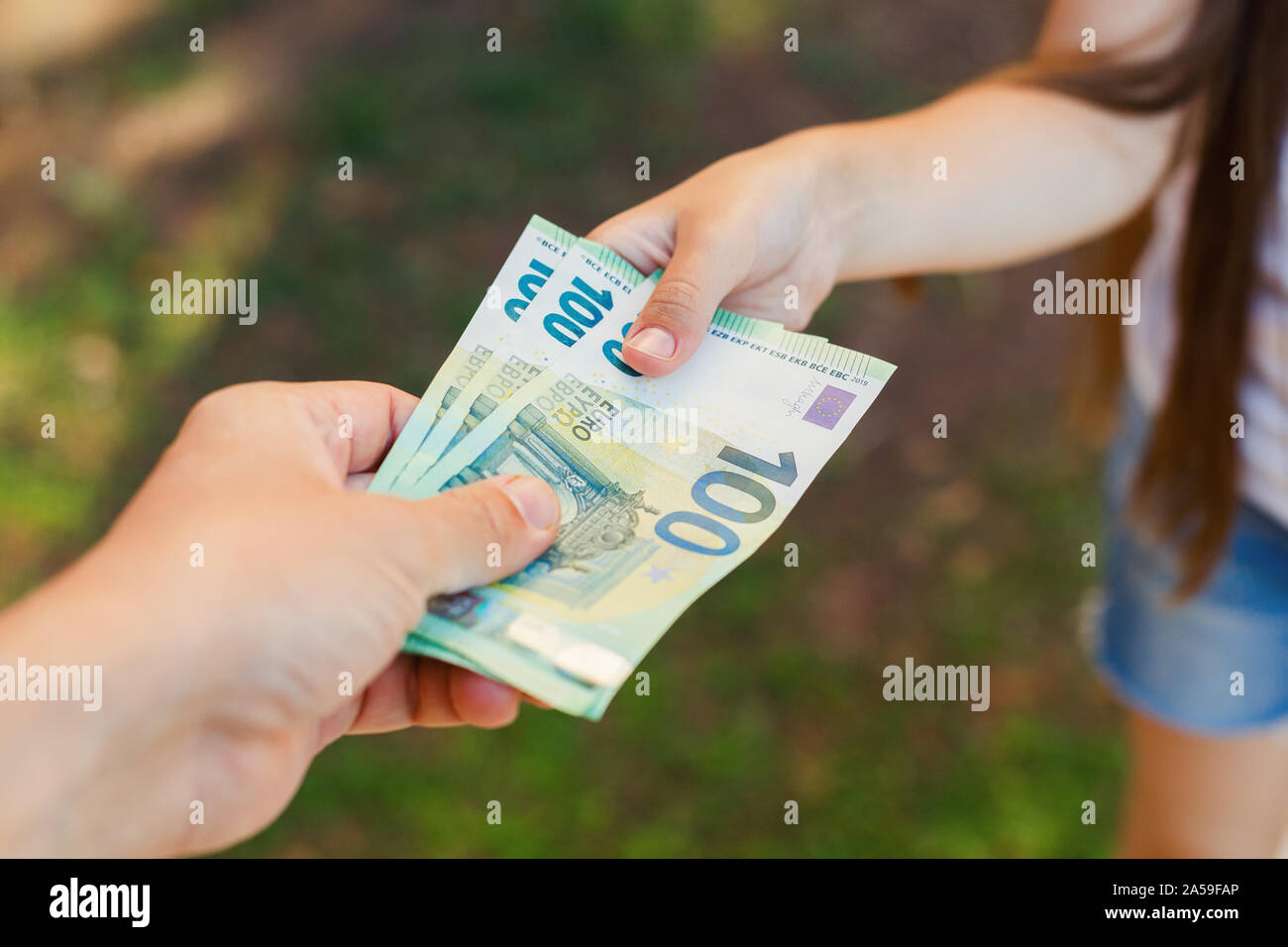 Child gives money hi-res stock photography and images - Alamy