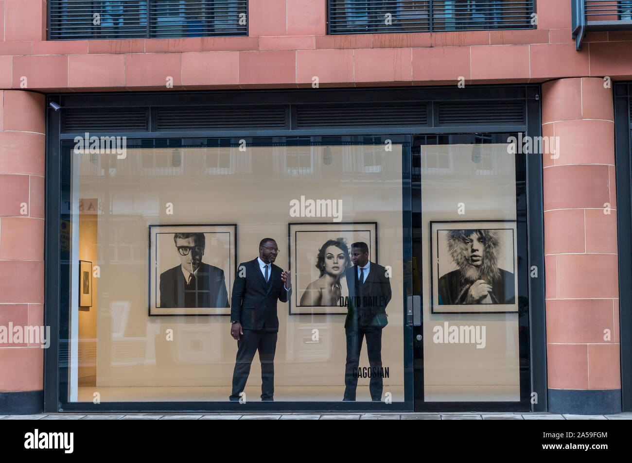 London Street Photography in Mayfair, Greater London. Security guard ...