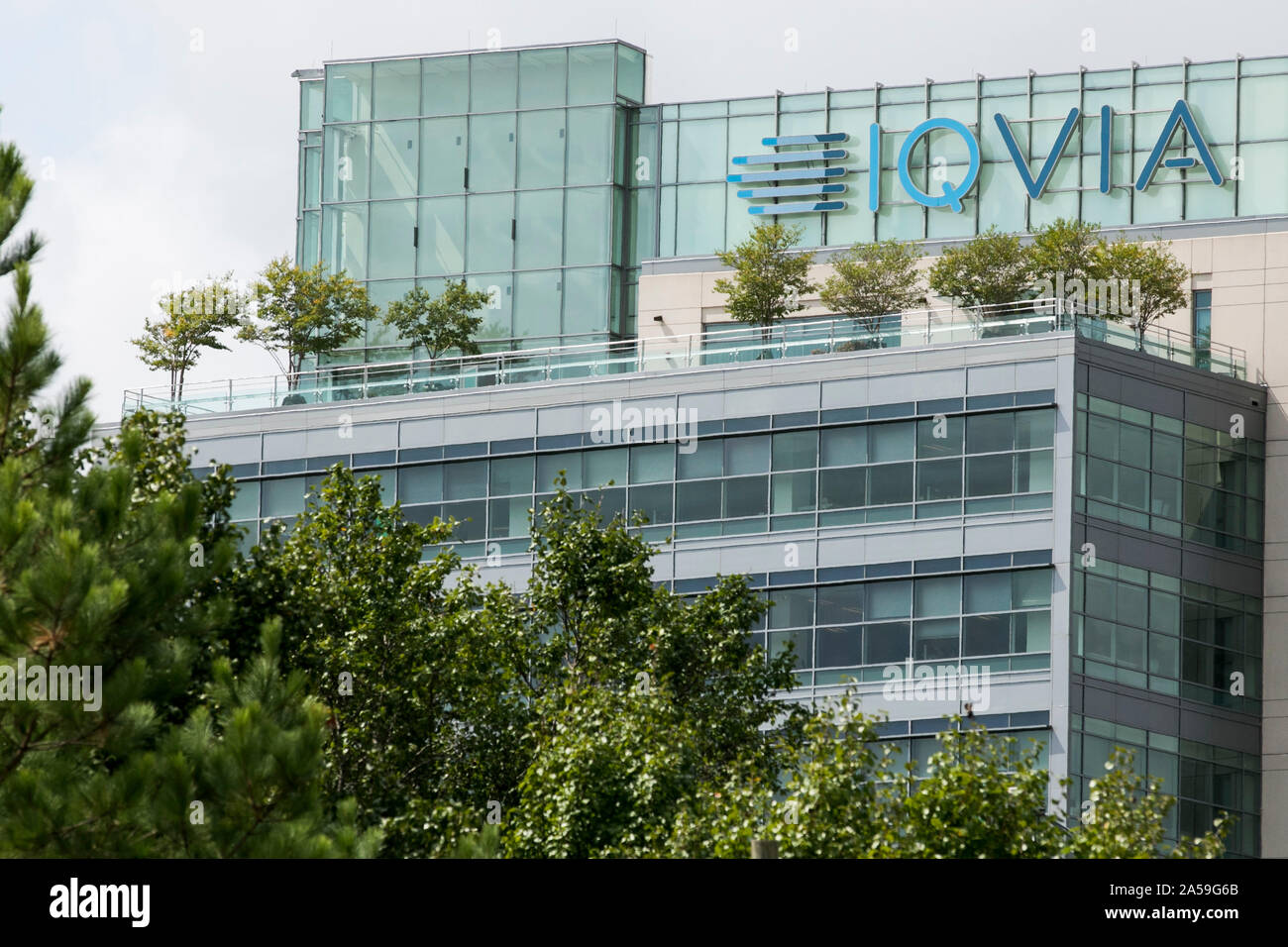A logo sign outside of the headquarters of IQVIA in Durham, North ...