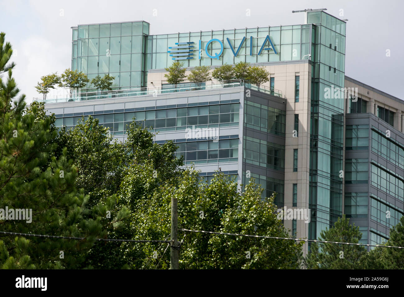 A logo sign outside of the headquarters of IQVIA in Durham, North ...