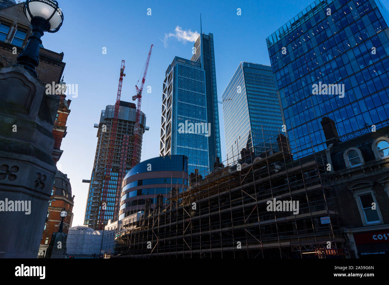 Cranes Over London Skyline. Iconic office buildings in London City ...