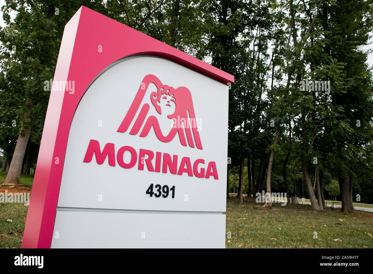A logo sign outside of a facility occupied by Morinaga & Company in ...