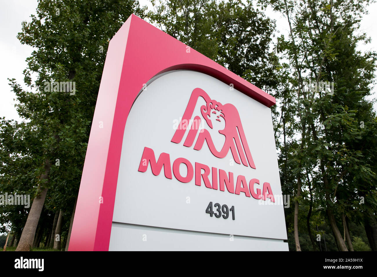 A logo sign outside of a facility occupied by Morinaga & Company in ...