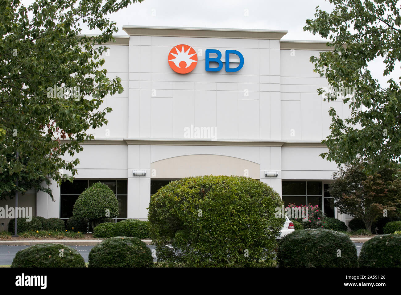 A logo sign outside of a facility occupied by Becton, Dickinson and ...