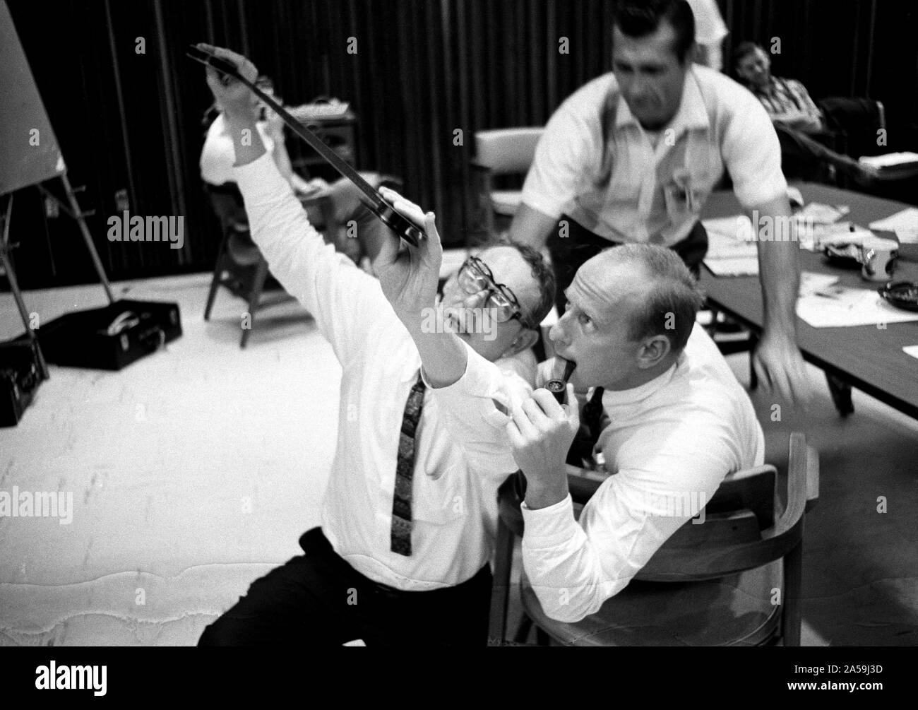 (23 Sept. 1966) --- Astronauts Charles Conrad Jr. (with pipe) and ...