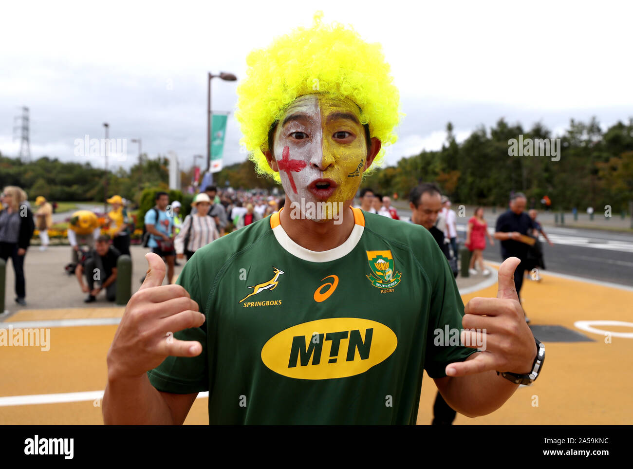 A rugby fan poses for a photo outside the stadium prior to the 2019 ...