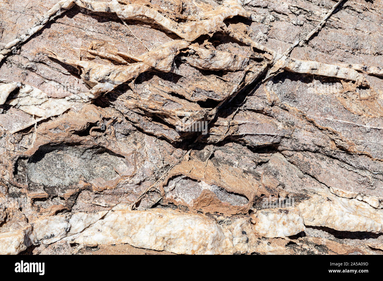 . Texture of the surface of the natural rock, where you can see the ...