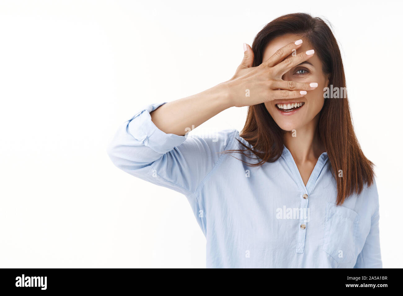 Carefree tender good-looking middle-aged brunette woman feeling playful ...