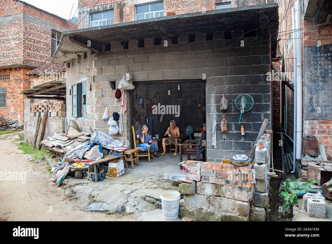 An older couple at home in the countryside village of Yiling, Nanning ...