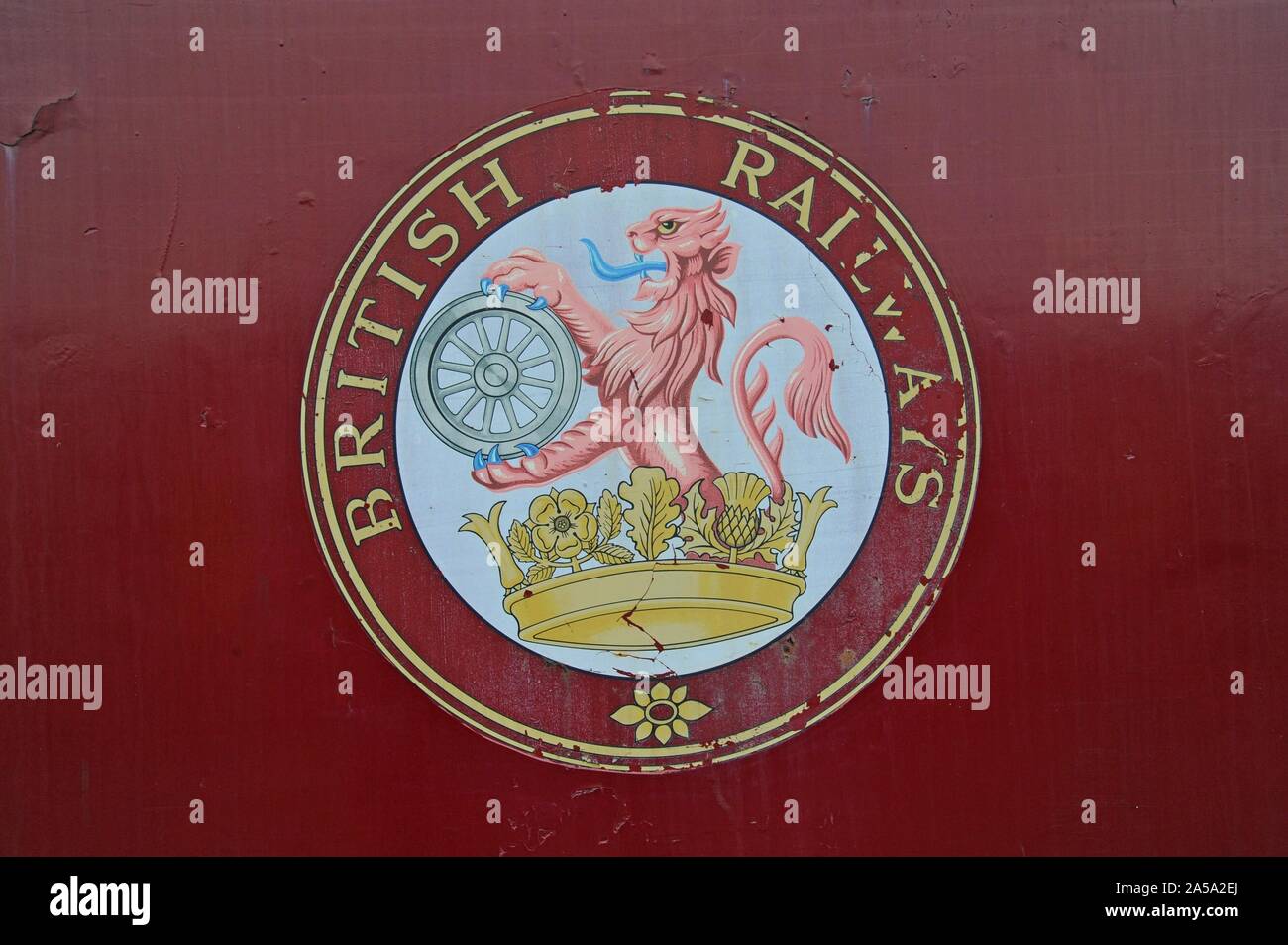 A weathered and worn British Railways emblem on the side of a Warship ...