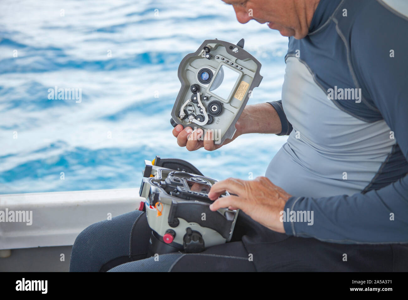 Scuba diver diving off boat hi-res stock photography and images - Alamy