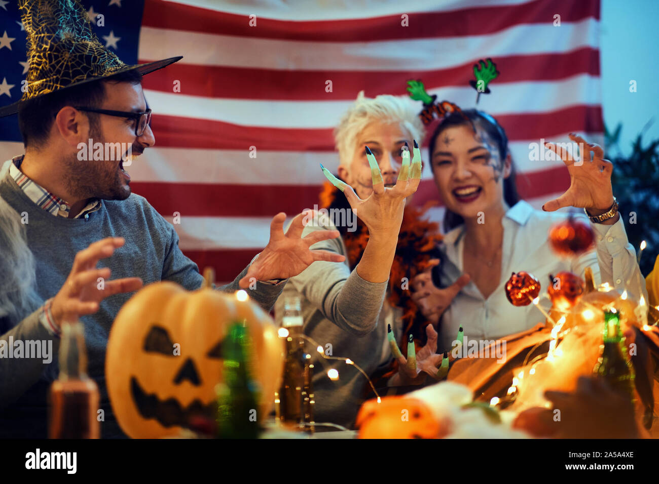 Creepy faces made by party.Scary People celebrate Halloween Stock Photo ...