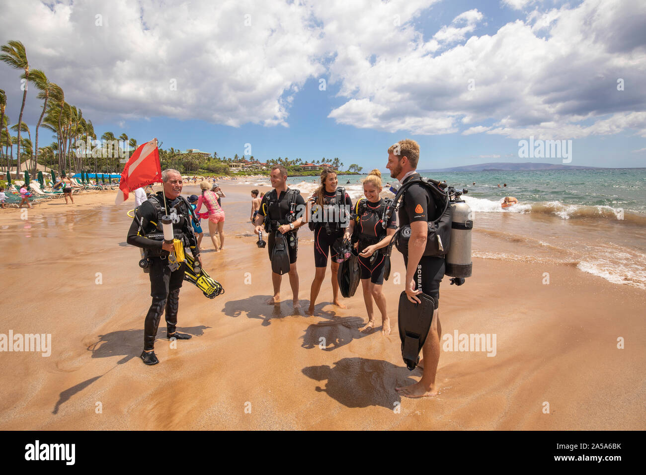 SCUBA diving instructor Anthony Manion on his way to the ocean with ...