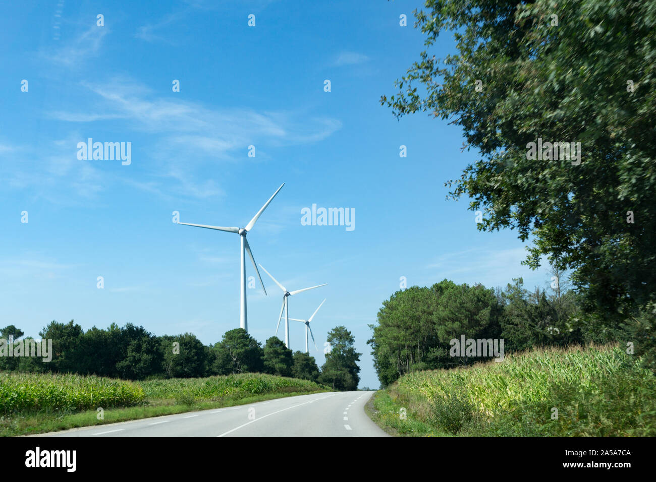 Wind turbines on side highway hi-res stock photography and images - Alamy
