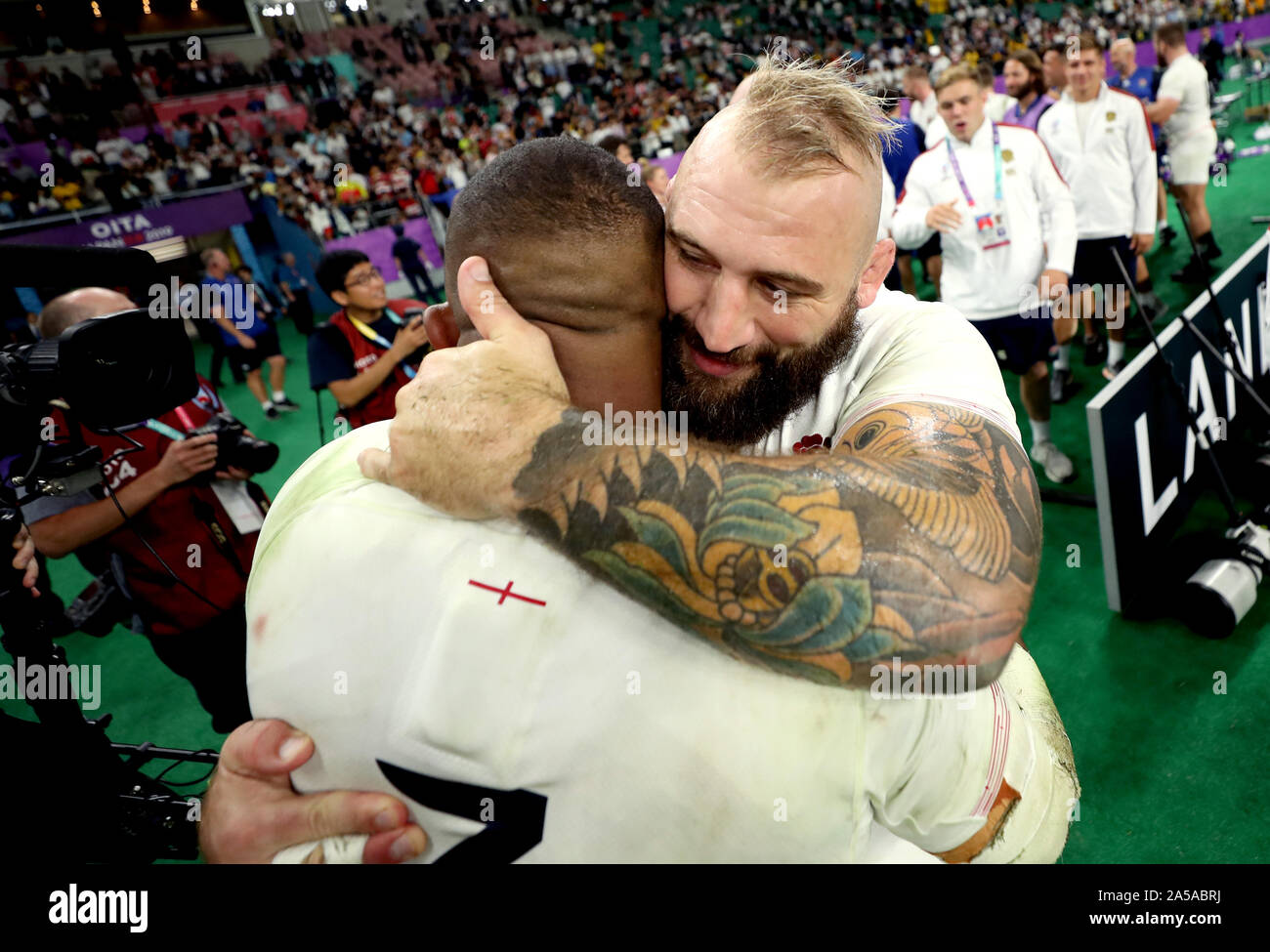England's Kyle Sinckler (left) hugs Joe Marler at the end of the 2019 ...