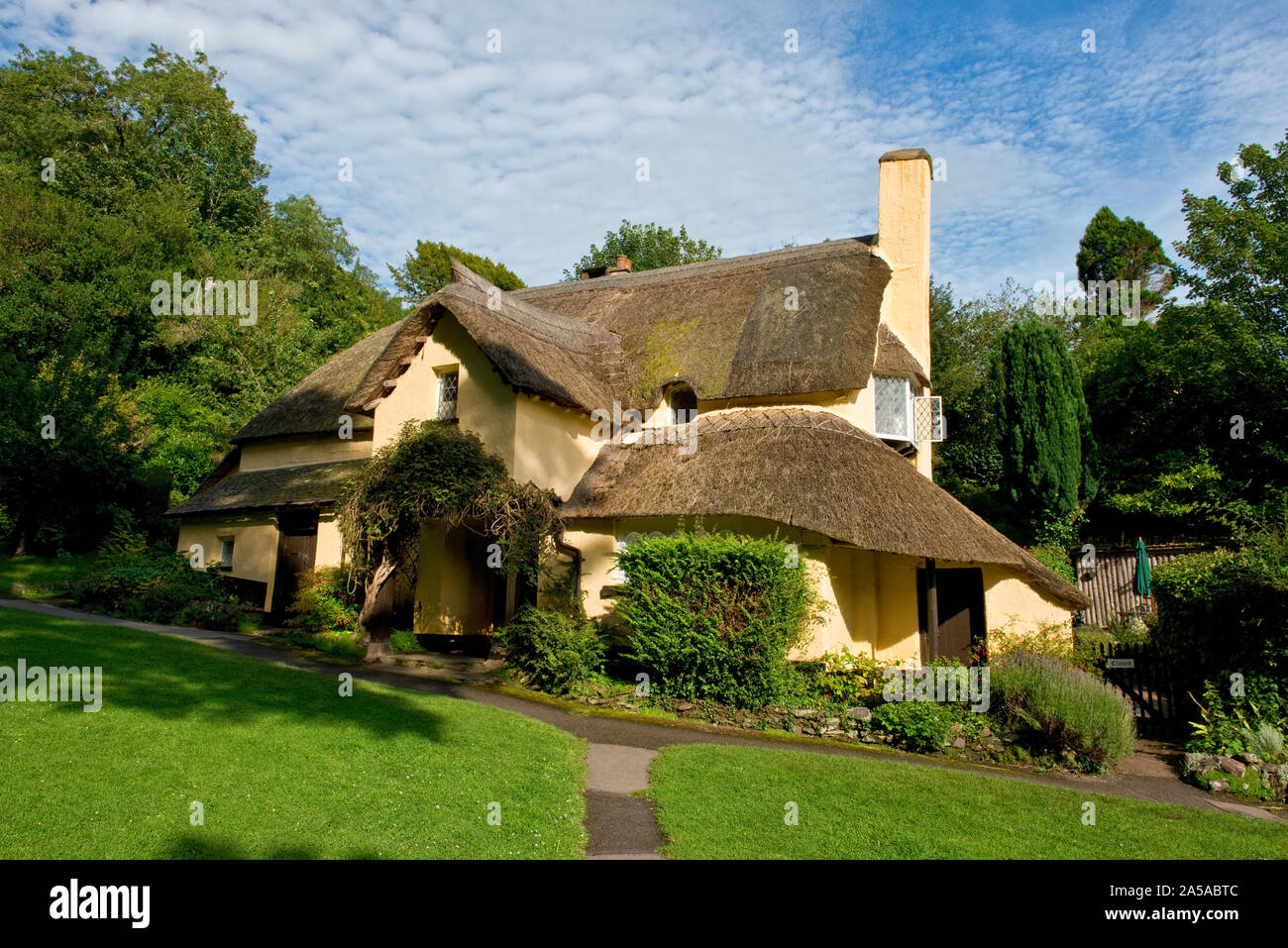 Thatched cottage in the picturesque village of Selworthy. Exmoor ...