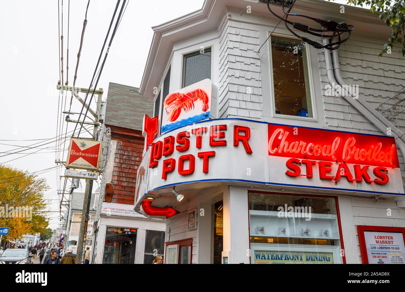 Cedar shingled frontage and illuminated neon name signs of local ...