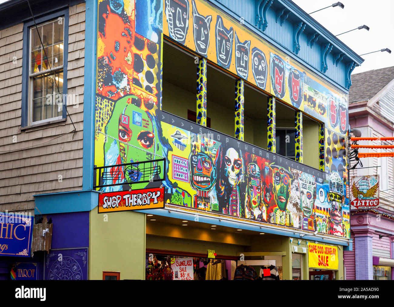 Colourful shopfront with unusual bizarre faces on a shop in Commercial ...