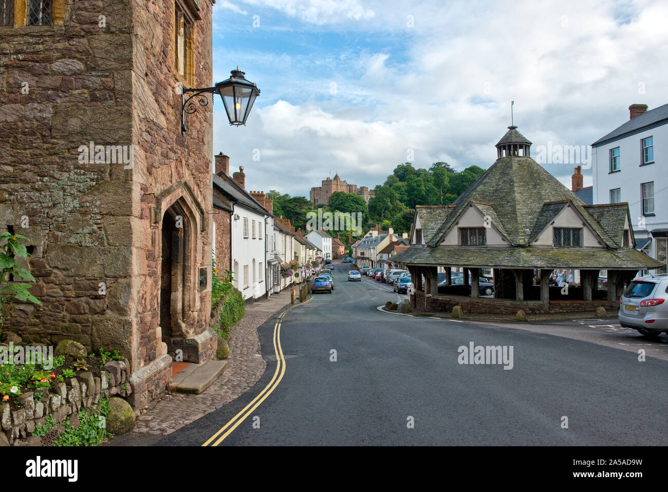 Dunster Yarn Market and Dunster Castle. Somerset Stock Photo - Alamy