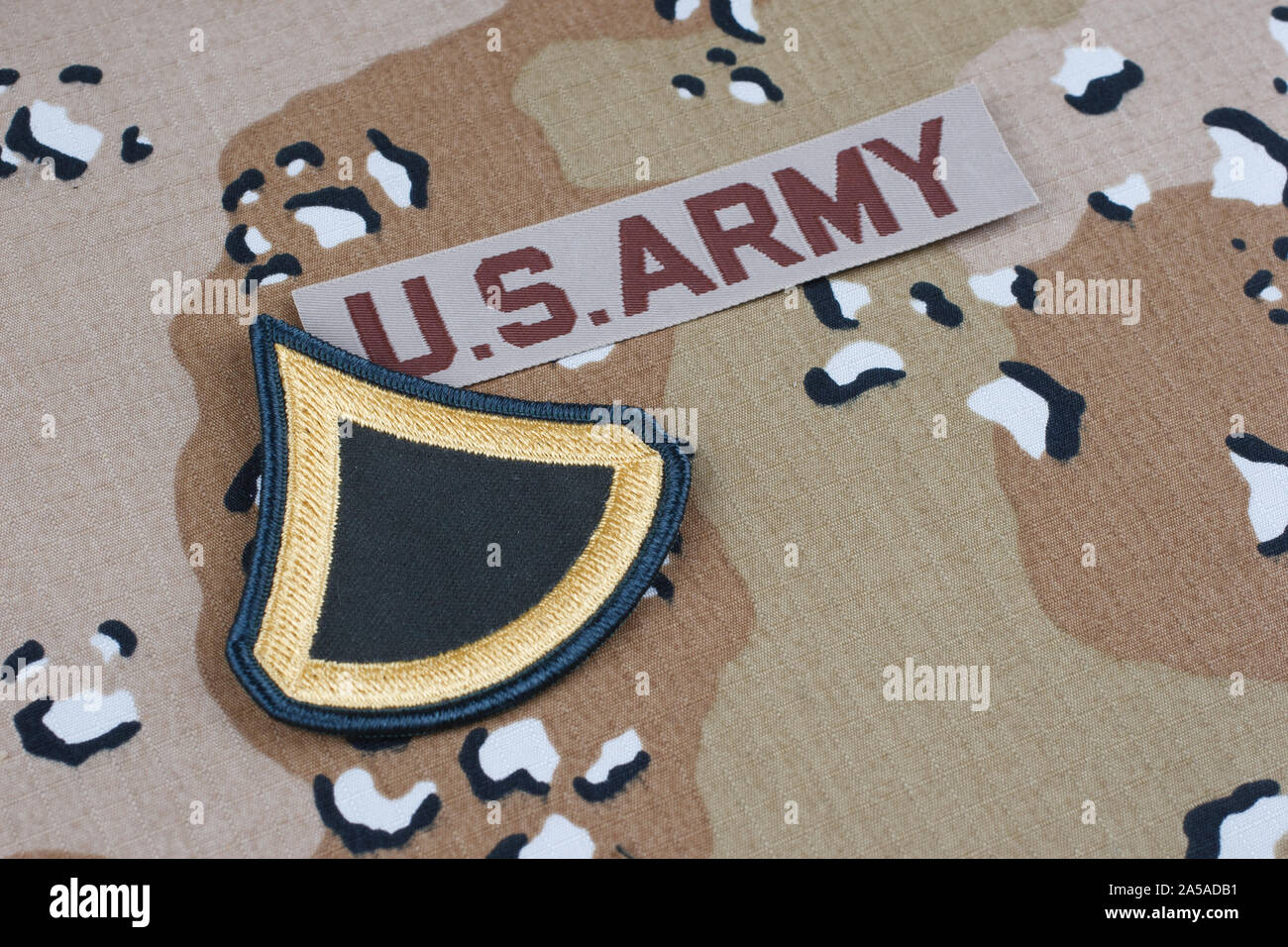 US ARMY desert pattern battle dress uniform with rank patch Stock Photo ...