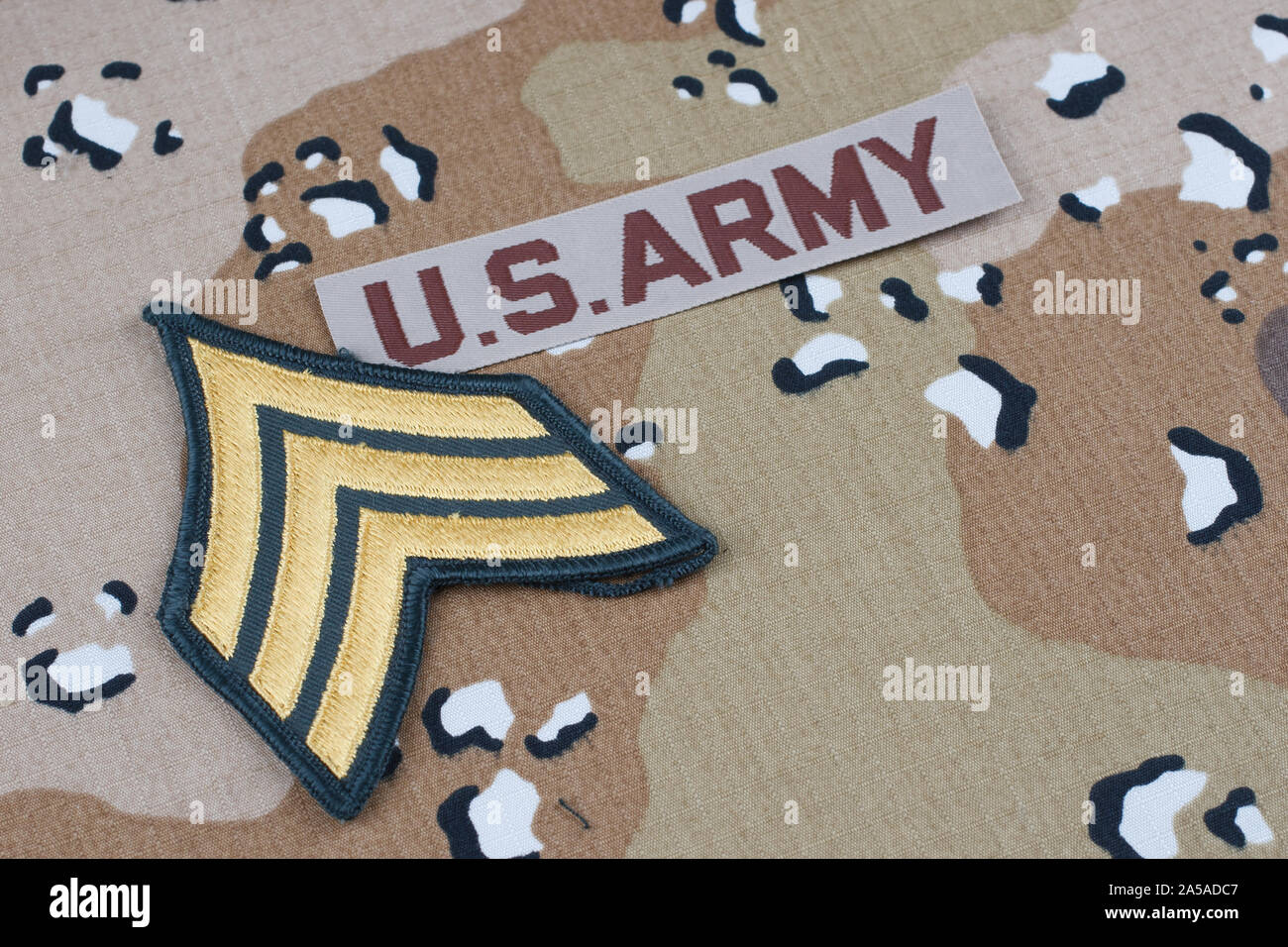 US ARMY desert pattern battle dress uniform with rank patch Stock Photo ...