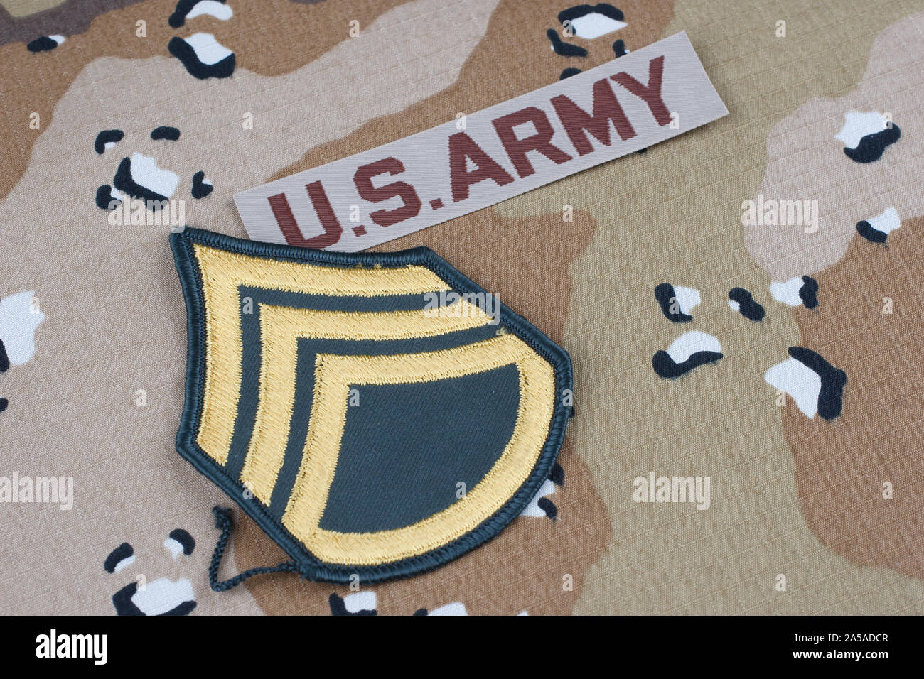 US ARMY desert pattern battle dress uniform with rank patch Stock Photo ...