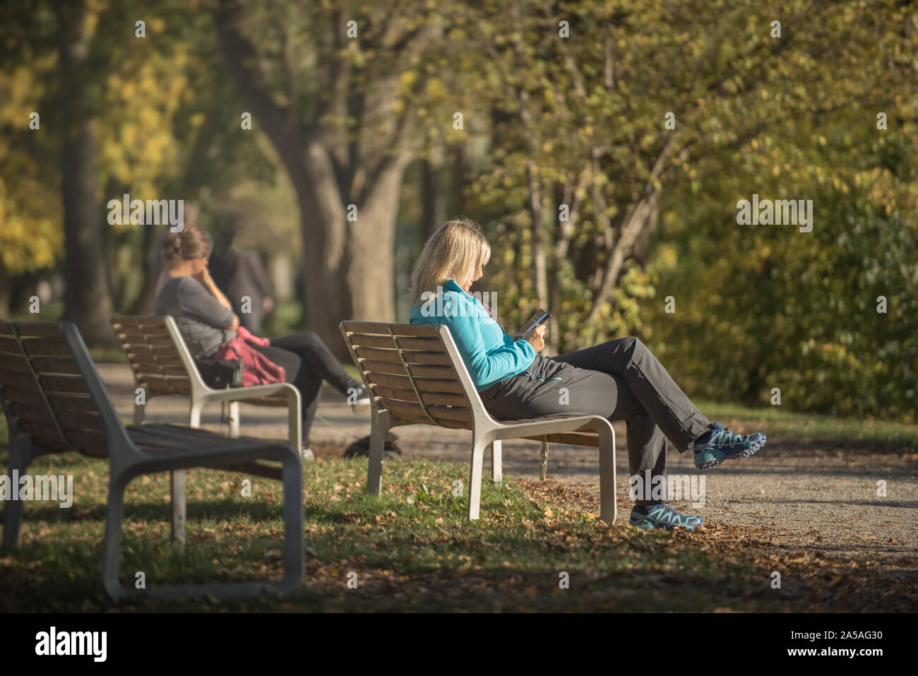Girl sunbathing in park hi-res stock photography and images - Alamy