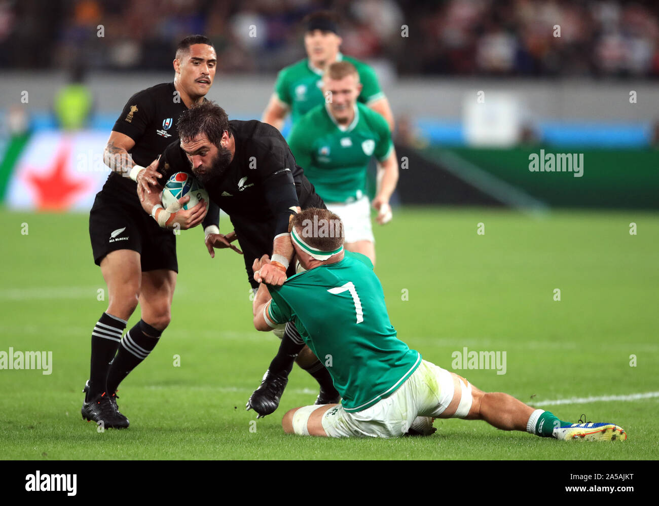 New Zealand's Sam Whitelock is tackled by Ireland's Josh van der Flier ...