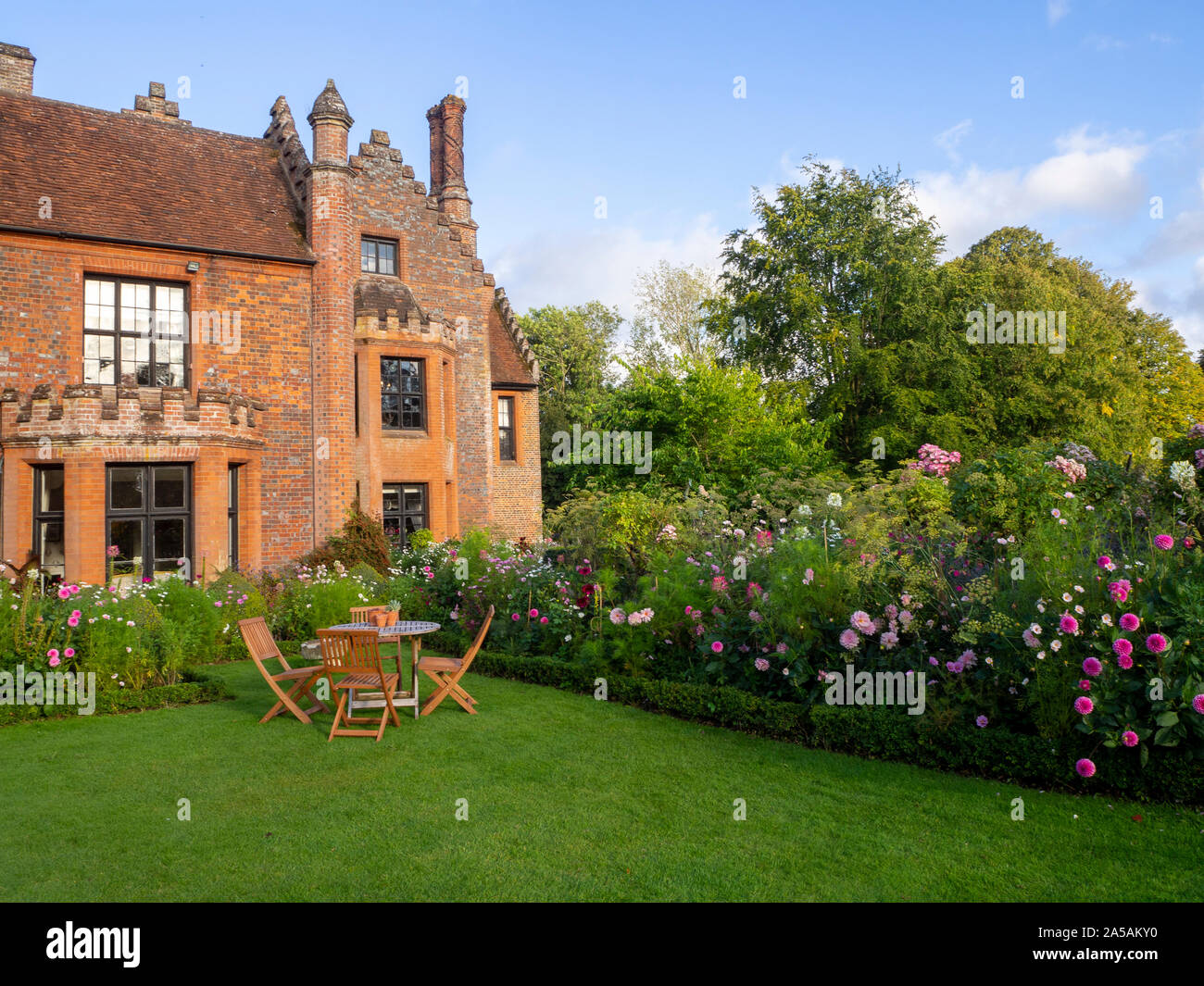 Chenies Manor House from main lawn.Fine weather, blue sky and ancient ...